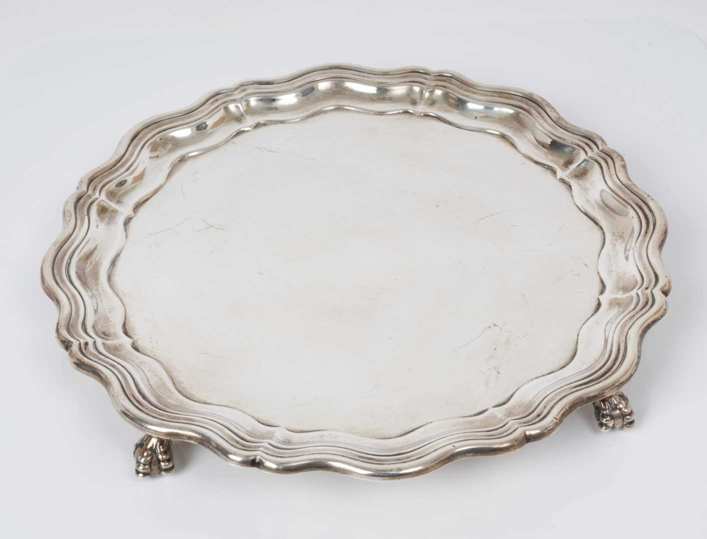 Lot 552 - George V silver salver / waiter of circular