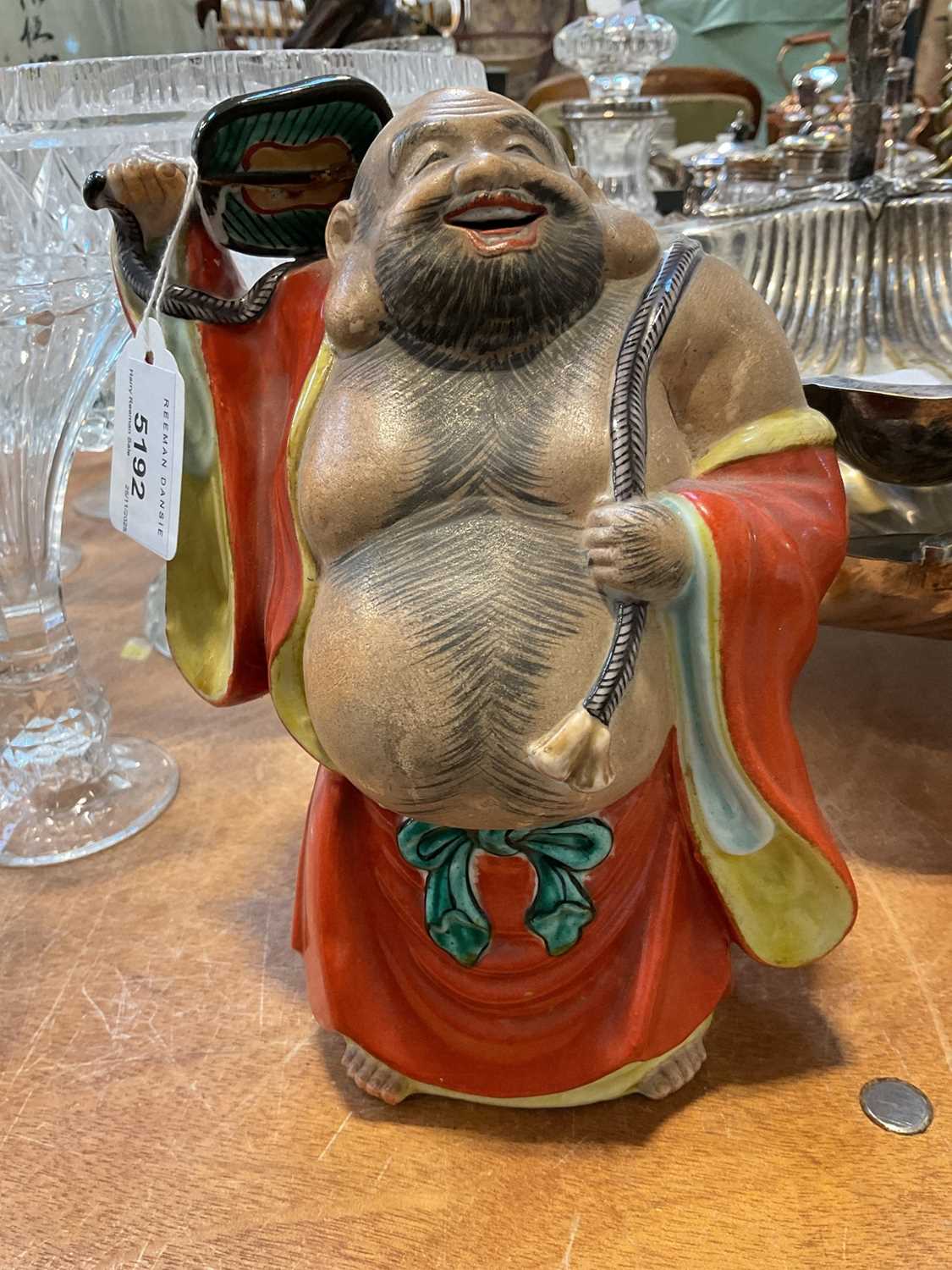 Lot 5192 - Oriental porcelain figure "Hotei"