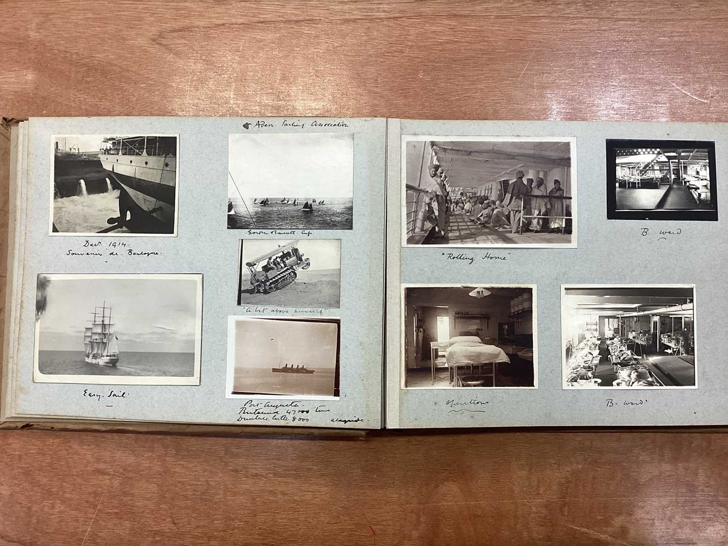 Lot 704 - Album of postcards and photographs with