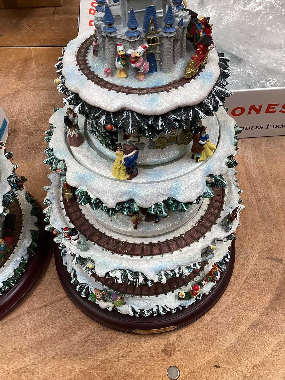 Lot 5143 - Two Disney Christmas trees